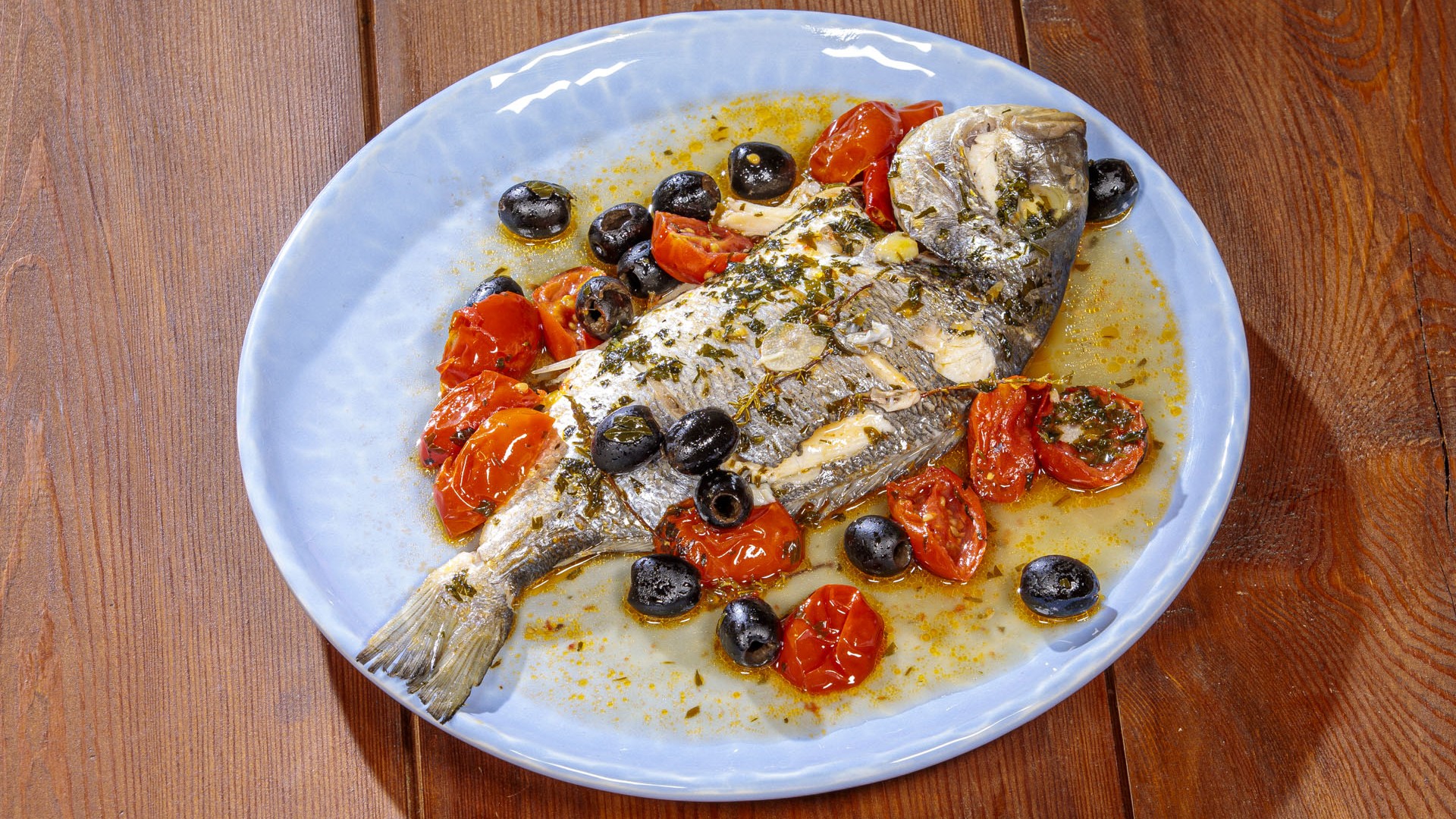 Orata in guazzetto - Ricette Casa Pappagallo