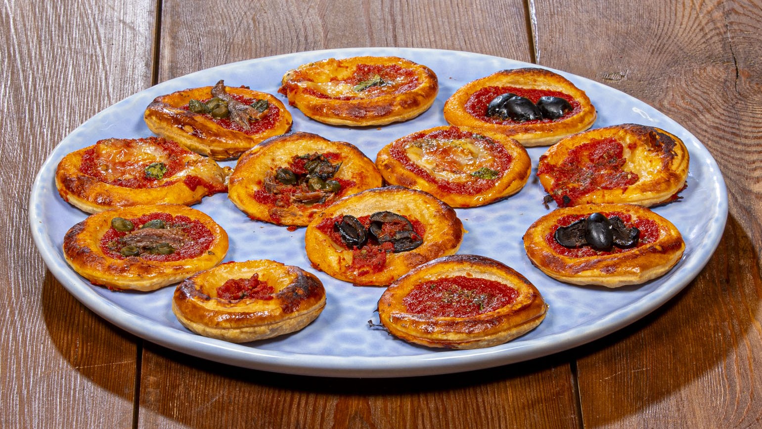 Pizzette di sfoglia - Ricette Casa Pappagallo